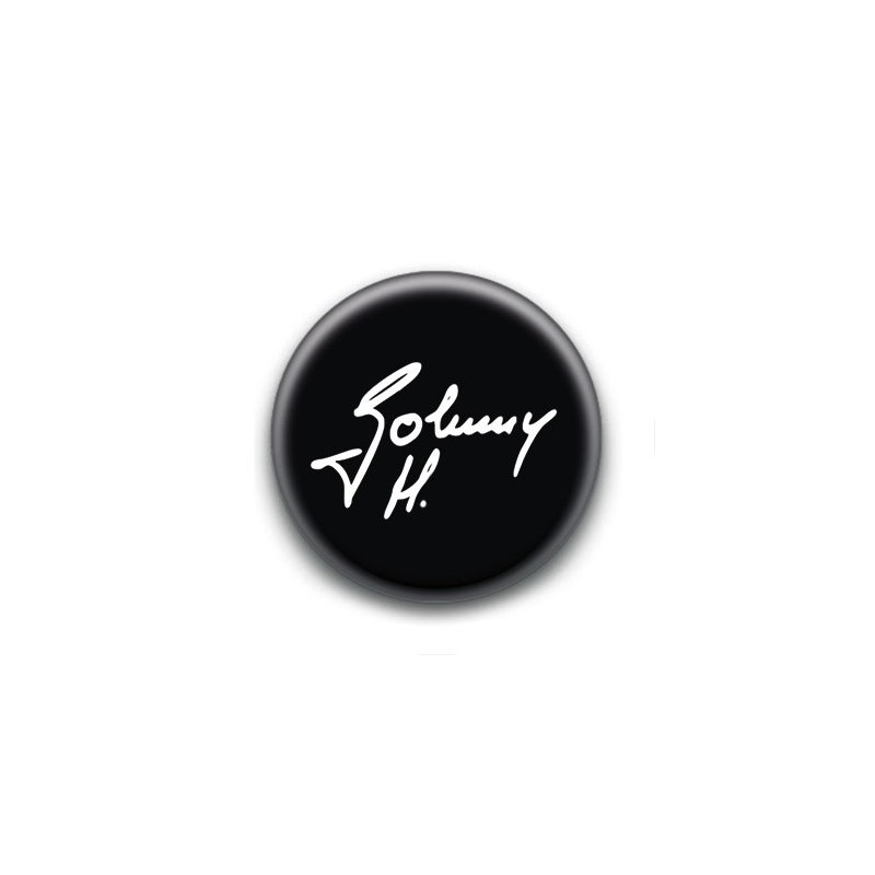 Badge : Johnny H, signature fond noir